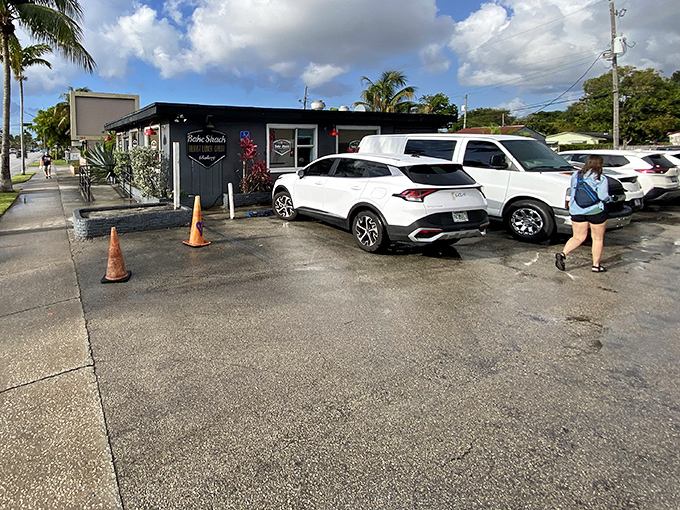 The modest parking area serves as the gateway to flavor town – where cars line up for access to some of Florida's most crave-worthy breakfast creations.