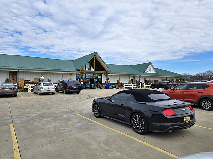 The expansive parking lot on a busy day shows Hog Creek's popularity among treasure hunters, with visitors traveling from across Michigan and beyond to explore this antique wonderland.