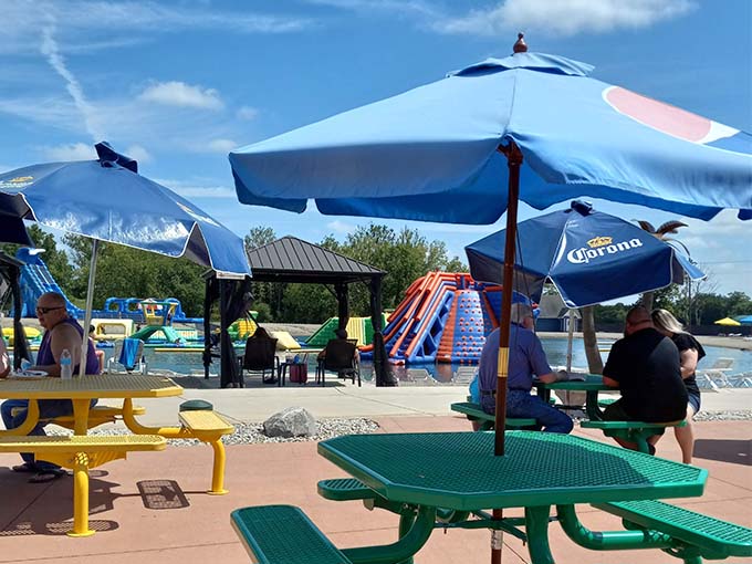Thatched umbrellas offering shade &ndash; because nothing complements a day of water fun quite like the illusion that you're on a tropical island instead of in Ohio.