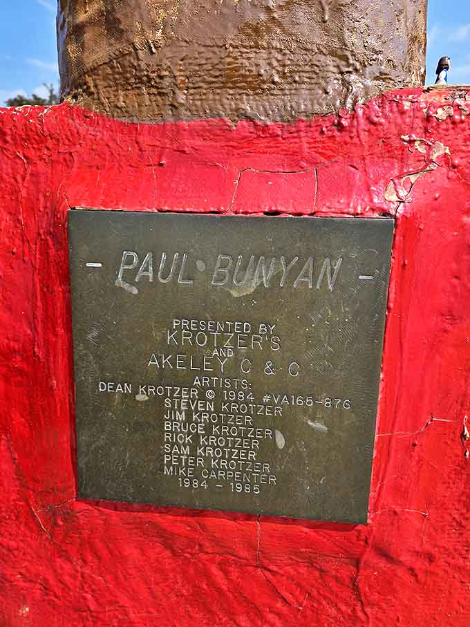 This plaque credits the Krotzer family and local artists who created this enduring monument to America's favorite fictional lumberjack.