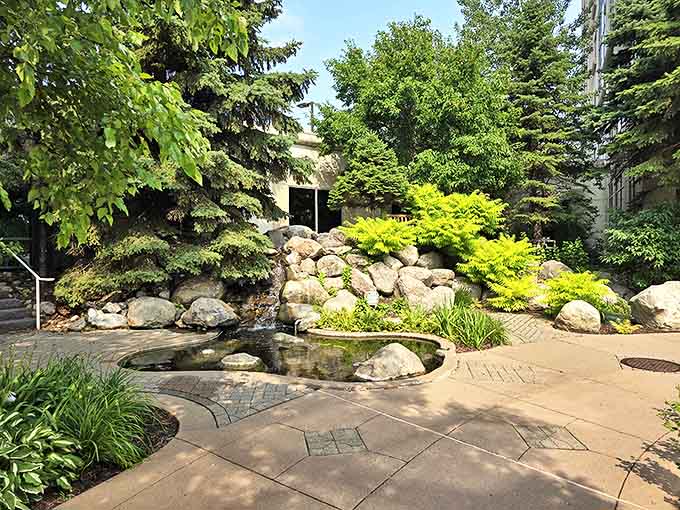 Tranquil ponds nestled among natural stone create peaceful retreats, where the gentle sound of water provides the perfect soundtrack for a moment of reflection.