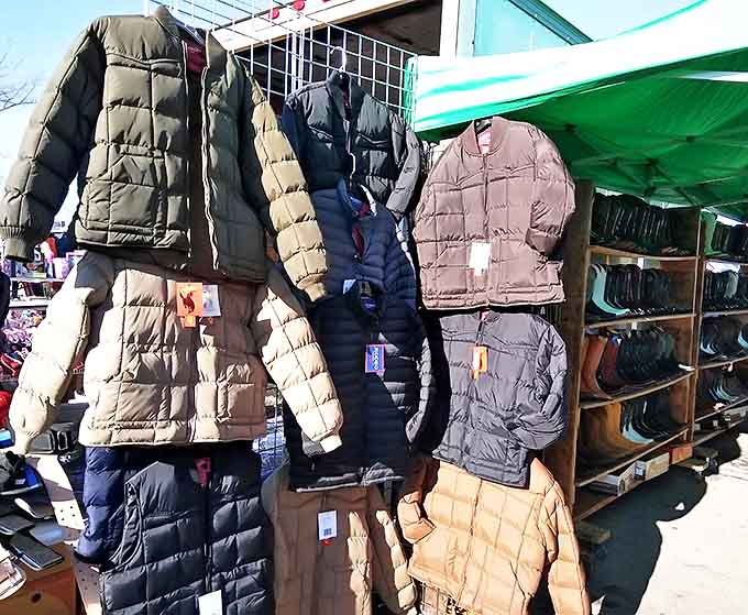 Puffer jackets in every neutral shade imaginable create a puffy parade of warmth – Illinois winter's most practical fashion statement.