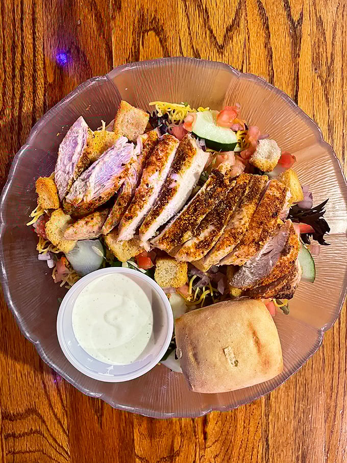 Blackened chicken atop fresh greens&mdash;proof that "eating light" at Mac & Joe's still means leaving completely satisfied.