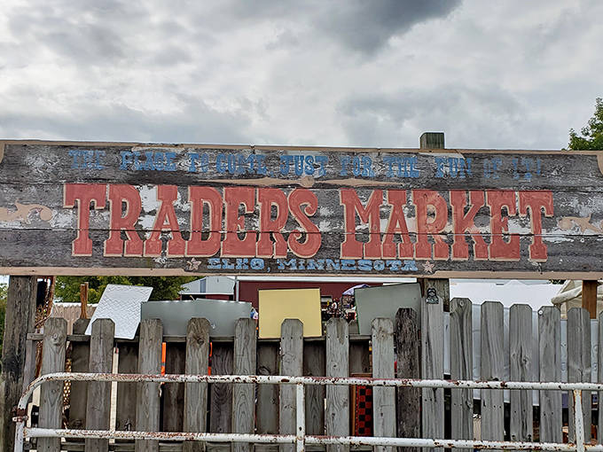 The faded market sign tells stories of countless weekends where ordinary people found extraordinary treasures among the stalls of Elko New Market.
