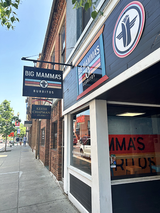Sign: The distinctive logo with its flying burrito emblem stands as a beacon of hope for the hungry &ndash; a promise of satisfaction just steps away.