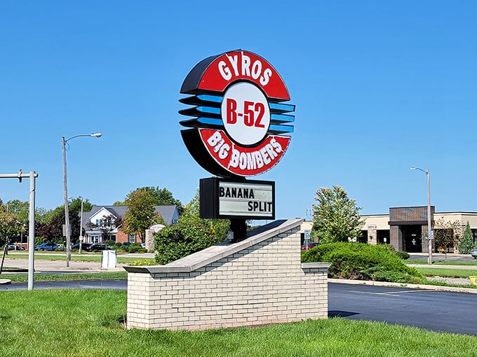The iconic B52 Bombers sign stands tall against the blue sky &ndash; a beacon for hungry travelers seeking something beyond ordinary diner fare.