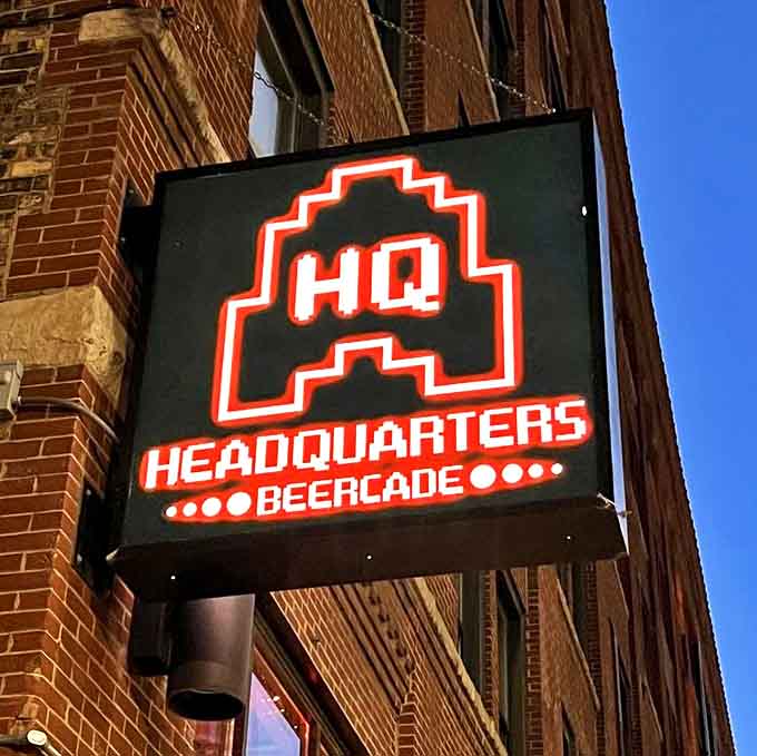 The Headquarters logo pays homage to classic gaming with its pixelated ghost design &ndash; a perfect symbol for this haunt where adult beverages meet childhood joy.