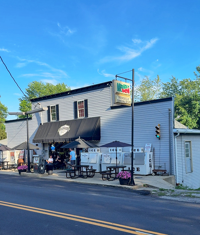 Storefront: As evening approaches, the Deersville General Store glows with welcome, a beacon of community in a world that moves too fast.