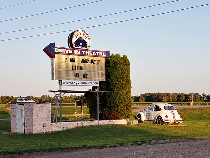The vintage entrance sign stands as a cheerful sentinel, welcoming film lovers to this beloved Minnesota institution since the golden age of drive-ins.