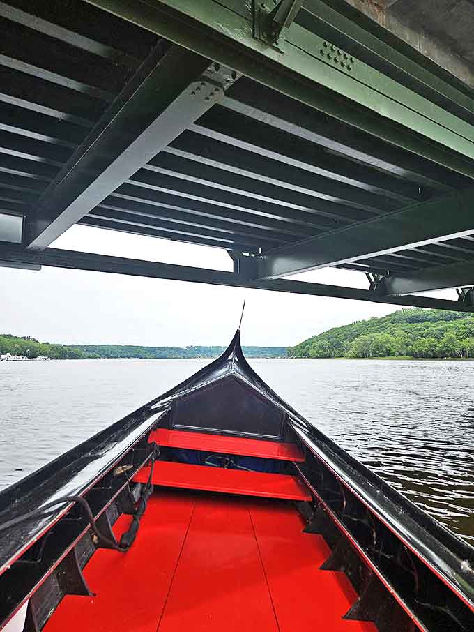 The gondola's elegant prow slices through reflective waters, leading adventurers into unexpected moments of wonder.