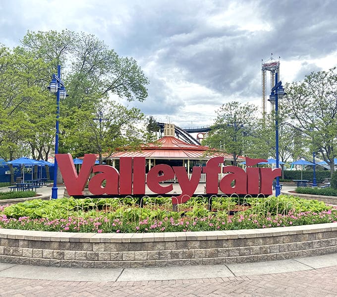 Valleyfair sign: The iconic red letters welcome visitors like an old friend, promising that beyond this point, adulting is optional and fun is mandatory.