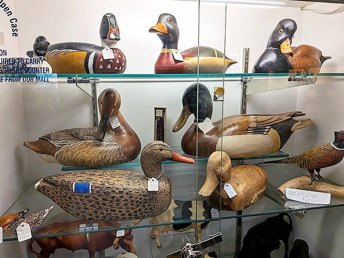 A flock of wooden duck decoys that have retired from hunting duty to become the aristocracy of rustic d&eacute;cor &ndash; functional art with feathers.