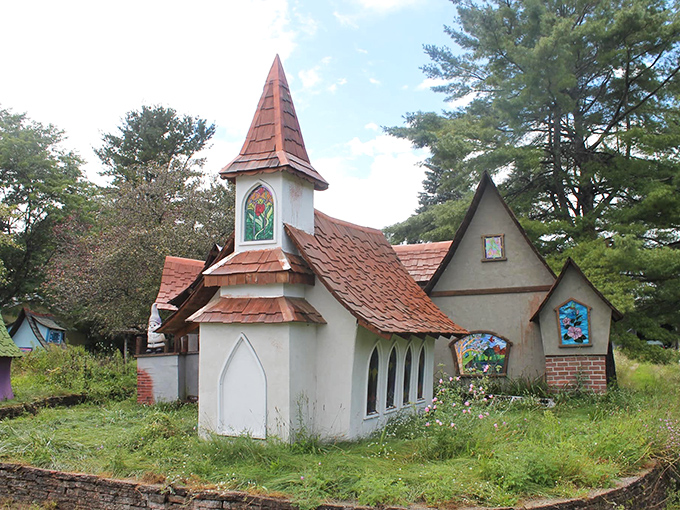 Another angle reveals how perfectly these whimsical structures nestle into their natural surroundings, as if they've always belonged.