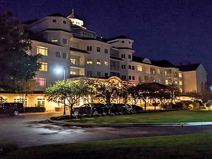 Even after dark, the Inn maintains its magical quality, glowing like a lighthouse of luxury against the night sky.