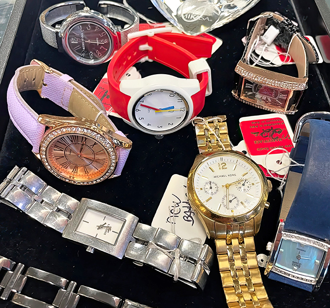 Time stands still in the watch display, where luxury timepieces await someone to wind them back to life.