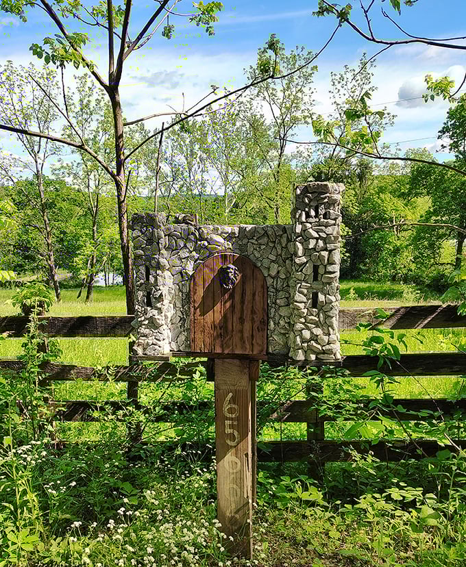 Even the mailbox embraces the medieval theme – a miniature stone castle complete with its own tiny wooden door and lion knocker.