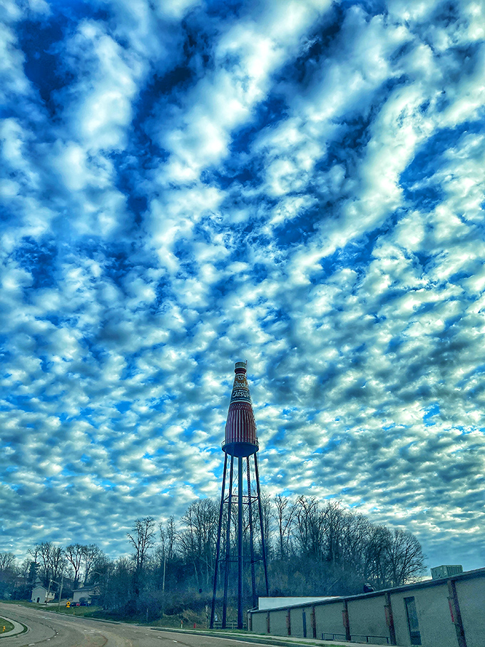 Clouds create a dramatic backdrop for this quirky landmark, as if Mother Nature herself is setting the stage for roadside theater.