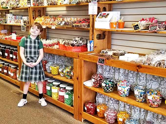 The joy of discovery is written all over this young visitor's face, standing amid shelves of treats that create childhood memories that will last a lifetime.