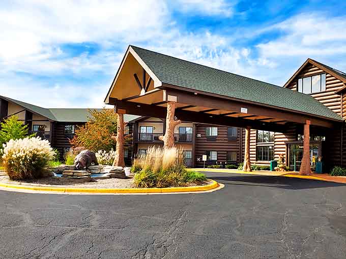 The resort's exterior embraces its woodland setting with log cabin styling that promises rustic charm with modern amenities inside.