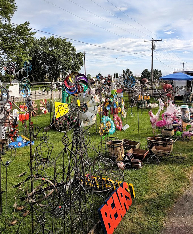 Garden art and whimsical metal sculptures create an outdoor gallery, with the "BEARS" sign pointing the way.
