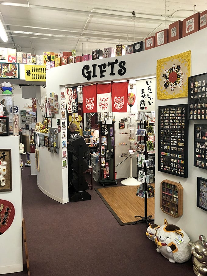 The gift shop offers visitors a chance to take home their own slice of luck, with lucky cats of all sizes waiting to bring fortune.