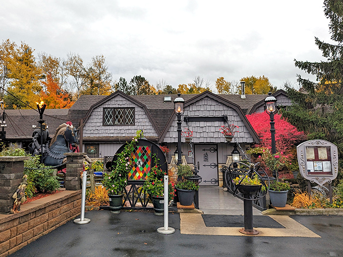 The exterior takes on a magical quality at dusk, with warm light spilling from windows and the distinctive silhouette standing out against the sky.