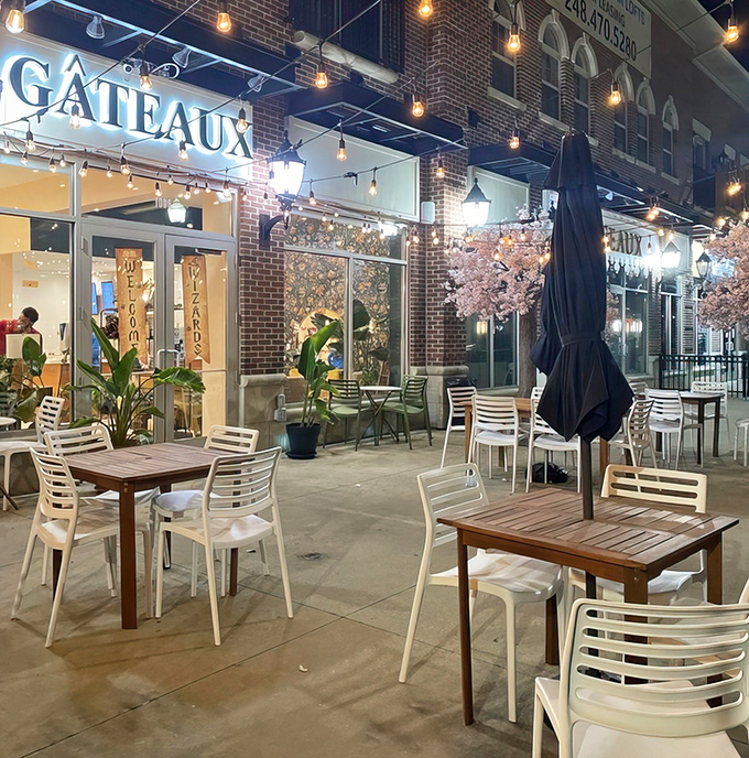 As evening falls, the illuminated exterior transforms into a beacon of sweetness, drawing dessert pilgrims like moths to a very delicious flame.