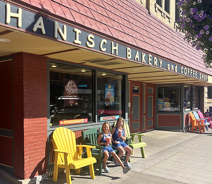 Colorful chairs outside invite passersby to pause and enjoy their treats in the fresh air, watching Red Wing life unfold around them.