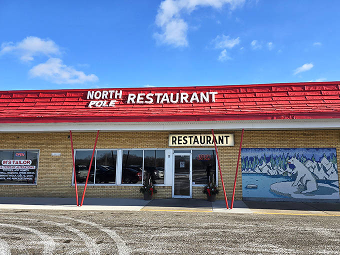 The welcoming exterior promises simple pleasures inside &ndash; a bright red beacon for hungry travelers seeking authentic Minnesota hospitality.