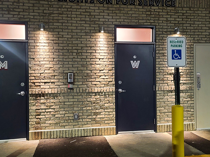 Even the restroom entrance maintains the vintage aesthetic, with classic brick and simple signage completing the immersive time-travel experience that is Swensons.