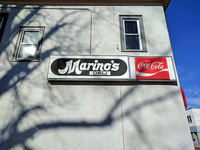 The vintage Marino's Deli sign on the building's exterior stands as a testament to the restaurant's enduring presence in the community.