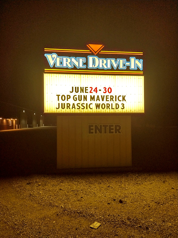The Verne's iconic sign glows against the night, a beacon calling movie lovers to this slice of preserved Americana.