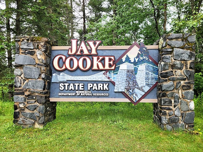 The iconic Jay Cooke State Park entrance sign welcomes visitors to one of Minnesota's most beloved natural treasures.