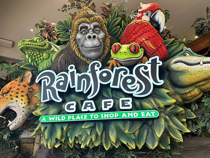 This rustic wooden welcome sign stands as a portal between everyday life and the natural sanctuary that awaits beyond.