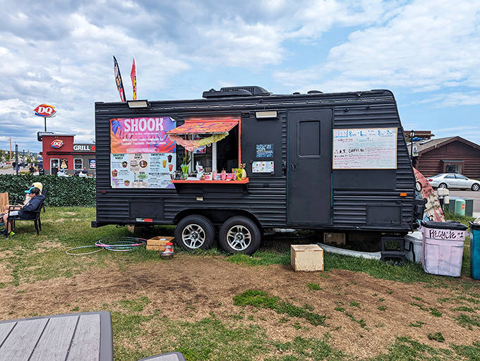 The distinctive black trailer with its bright signage has become a beloved fixture in Grand Marais, drawing smoothie enthusiasts from near and far.