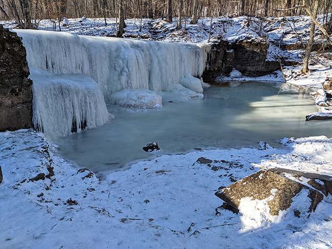 Winter transforms Hidden Falls into a frozen fantasy world – nature's ice sculpture competition where every formation wins first prize.