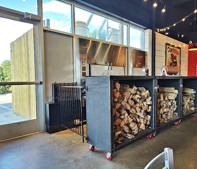 Stacks of wood by the smokers aren't just for show &ndash; they're the essential ingredient in the alchemy that transforms tough cuts into tender treasures.
