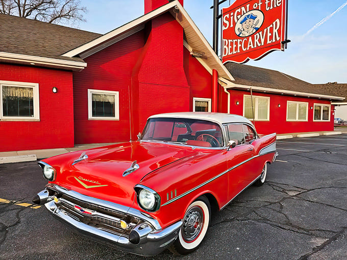 A classic Chevy matches the restaurant's vibrant red exterior &ndash; both American icons representing quality, reliability, and timeless appeal.