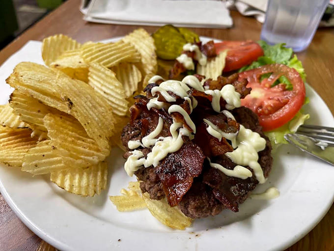 This open-faced burger masterpiece proves that sometimes the best things in life don't require utensils &ndash; just plenty of napkins.