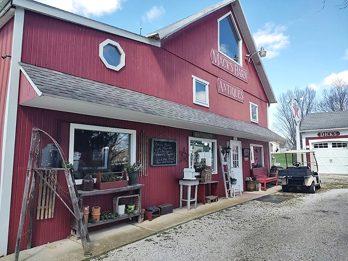 Mack's Barn stands proudly in crimson splendor, its weathered boards and white trim promising treasures within this rural Ohio landmark.