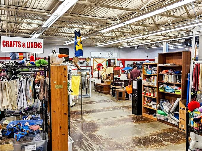 Inside the Ann Arbor PTO Thrift Shop, organized sections for crafts and linens make treasure hunting a breeze. Bargain paradise awaits!