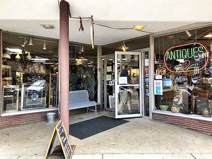 Step through these doors and enter a wonderland of vintage finds, where the neon "ANTIQUES" sign promises discoveries that can't be found at ordinary stores.