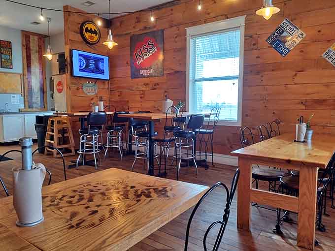 Warm wood paneling and simple furnishings create the perfect backdrop for barbecue feasting, no distractions from the main event.