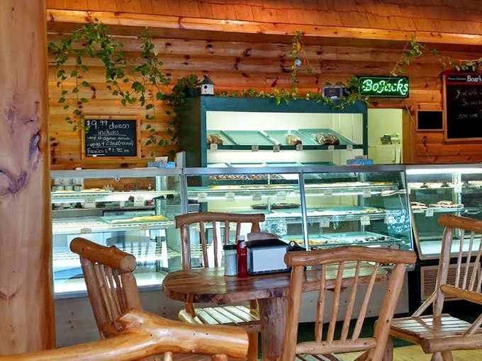 Inside, the northwoods aesthetic continues with handcrafted wooden furniture, creating a space that feels like dining in a luxurious treehouse.