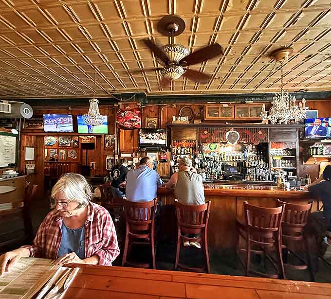 Inside Brown Bear, time stands still under ornate chandeliers and pressed tin ceilings, where regulars perch at the bar trading stories over cold beers.