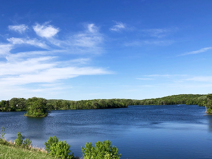 The calm blue waters mirror the sky so perfectly, you'll wonder if you're looking at the lake or having an out-of-body experience.