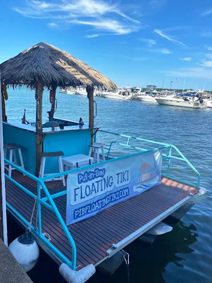 Docked and ready for adventure, this floating oasis offers an intimate escape with its thatched roof and cozy bar setup.