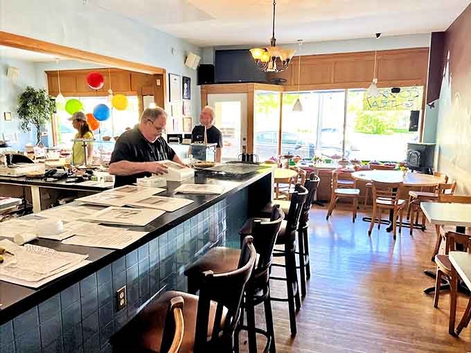 Inside, wooden tables and a welcoming counter create the perfect stage for pie-centered conversations and coffee-fueled friendships.