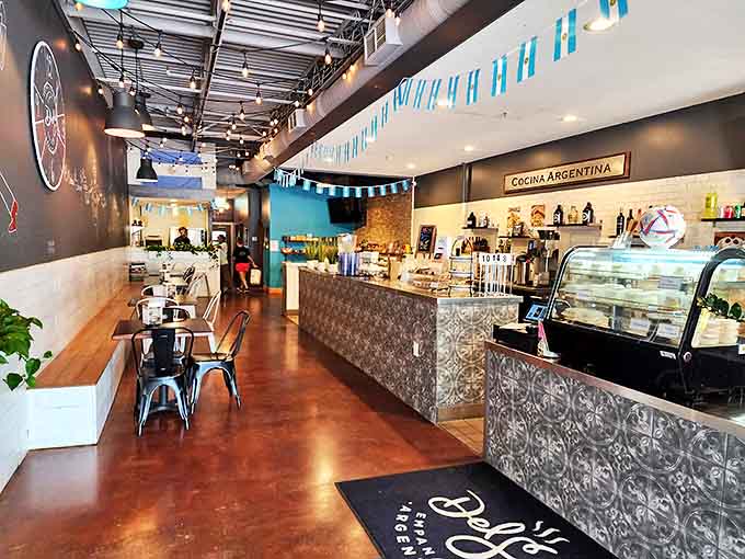 Step inside and Buenos Aires comes to Minnesota! The stylish interior blends industrial chic with Argentine warmth, complete with blue and white bunting overhead.