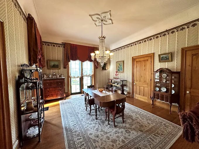 Victorian dining wasn't just about eating &ndash; it was theater. This meticulously preserved dining room awaits phantom guests who appreciate proper place settings.